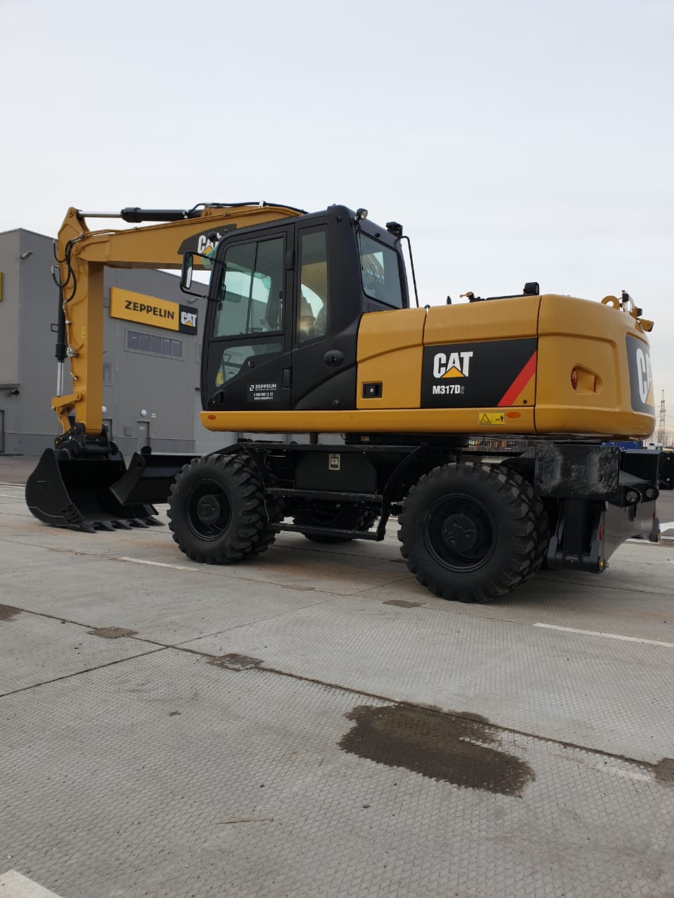 CATERPILLAR M317D2 | Аренда спецтехники Питерспецтехника